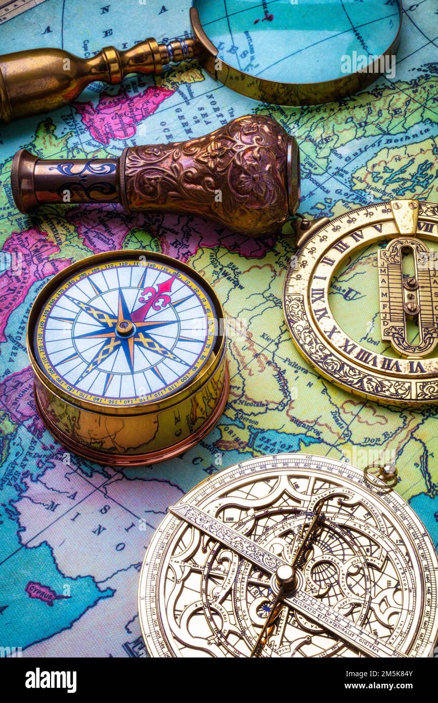 Compass And Astrolabe On Old Map Still Life Stock Photo - Alamy