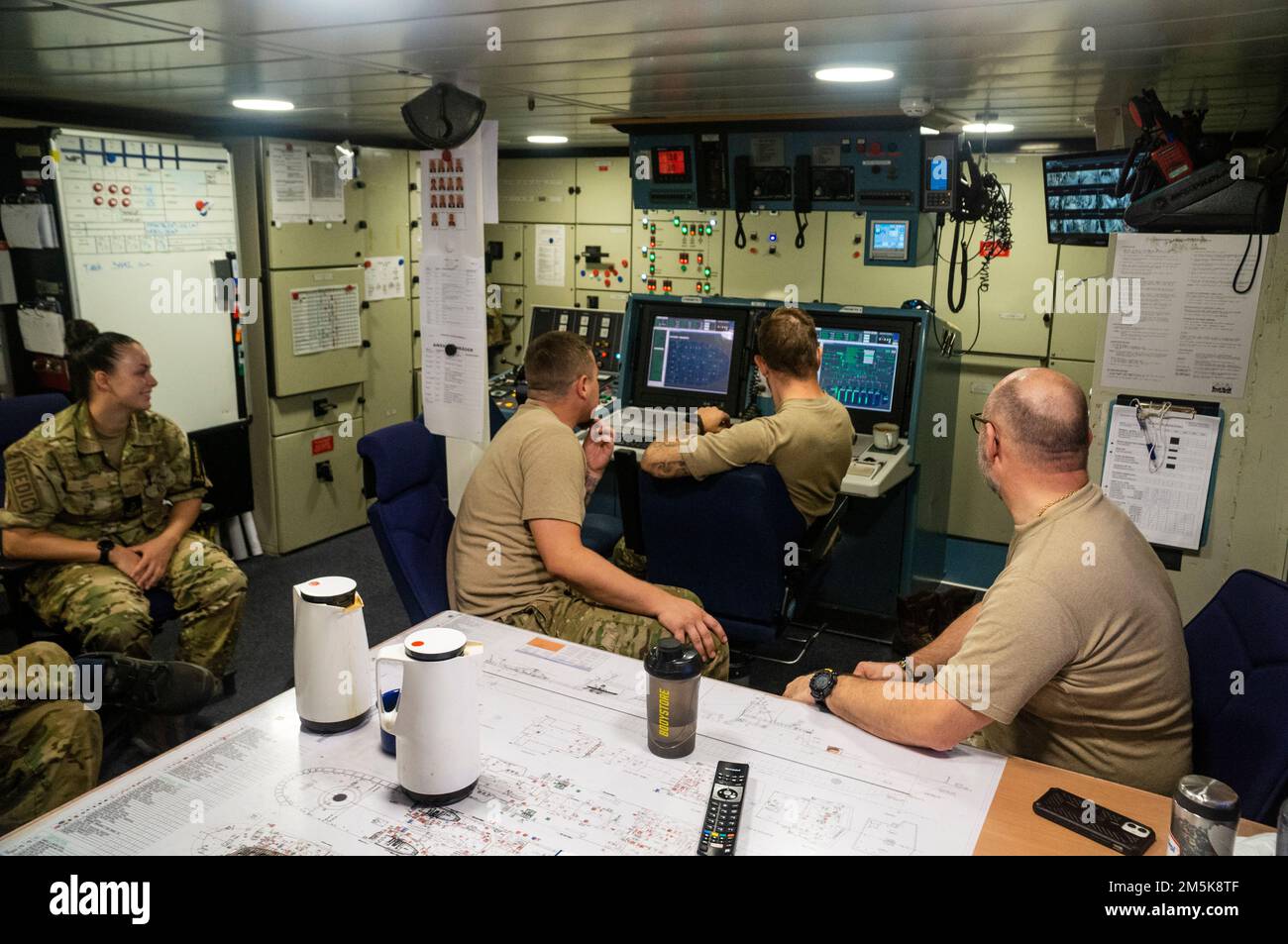 Sailors crew the Machinery Control Room onboard the Royal Danish Navy's ...