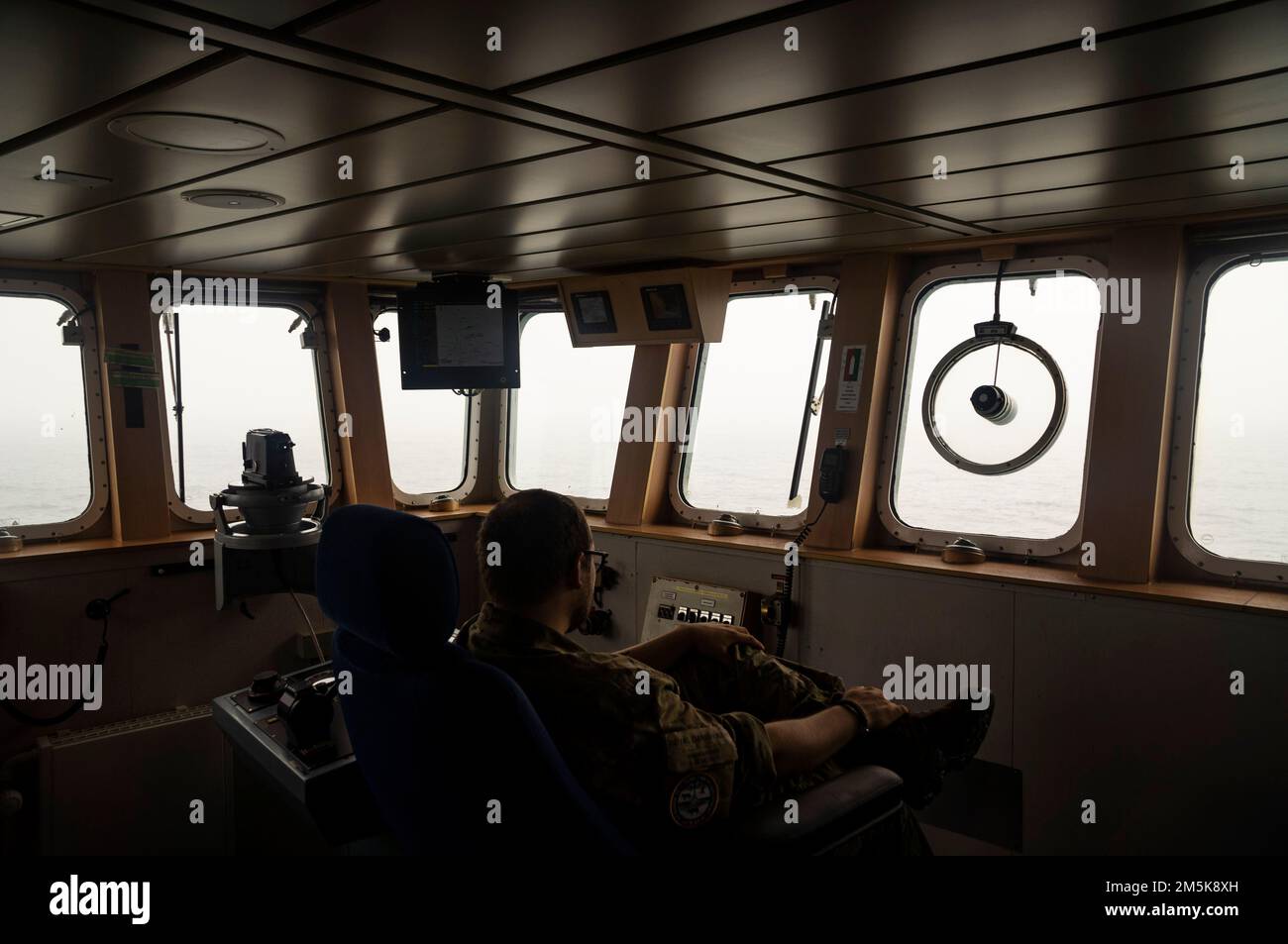 Sailors standing watch on the bridge of the Royal Danish Navy patrol ...