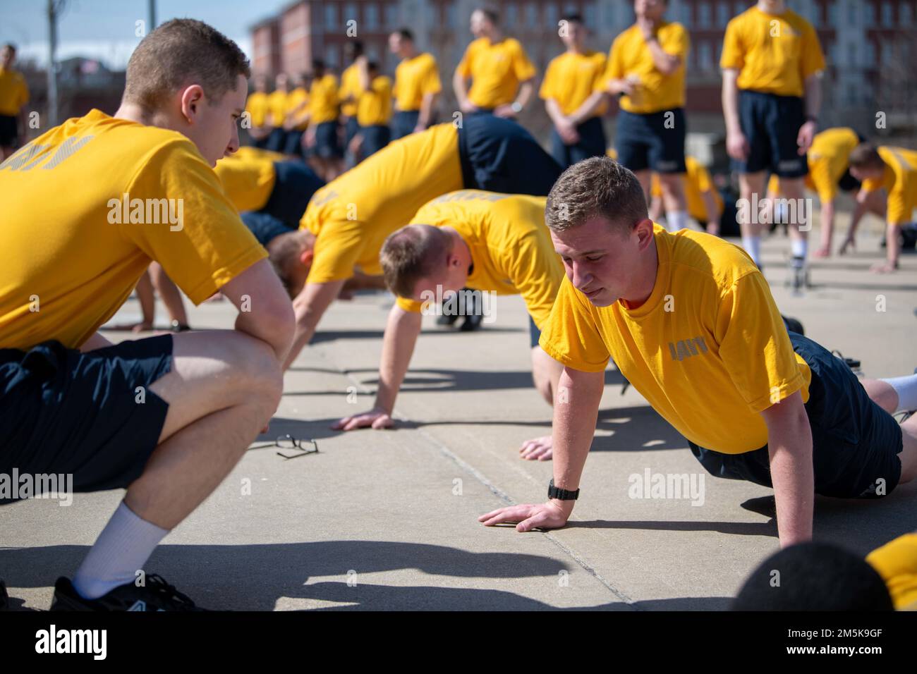 Recruits perform a physical training session outside at Recruit ...