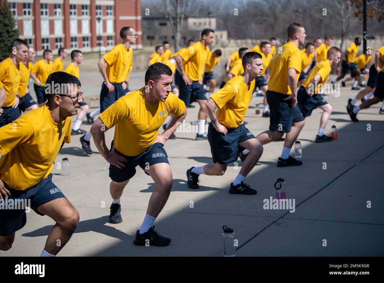 Recruits perform a physical training session outside at Recruit ...