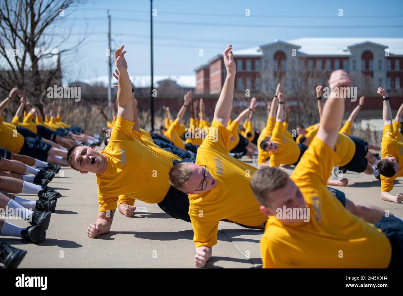 Recruits perform a physical training session outside at Recruit ...