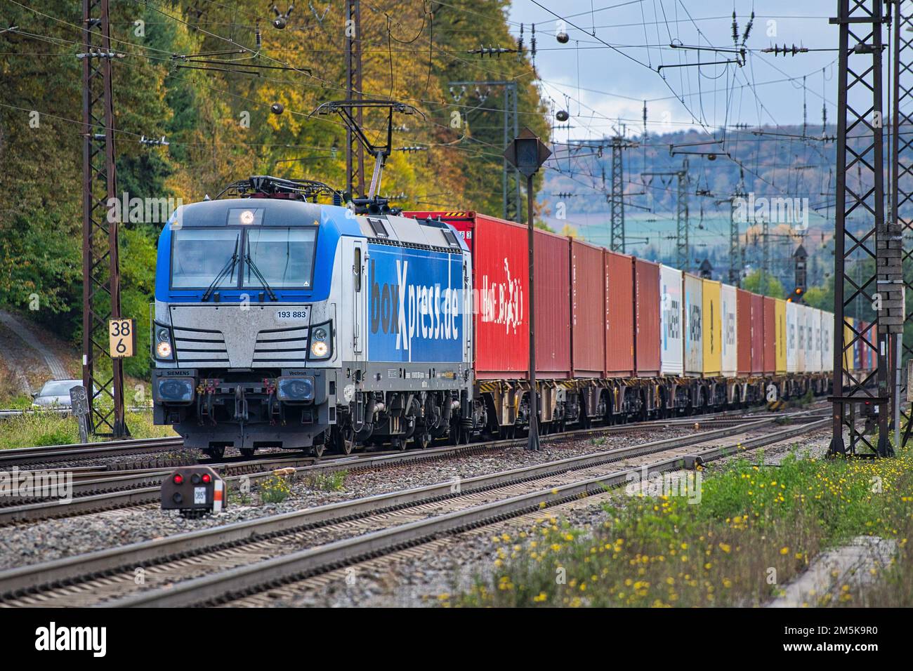 A class 193 locomotive, Siemens VECTRON, from BOXXPRESS pulling a freight train through ...