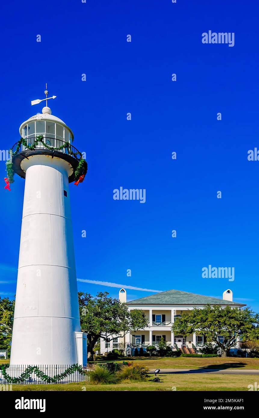 The Biloxi Lighthouse is decorated for Christmas in front of the Biloxi ...