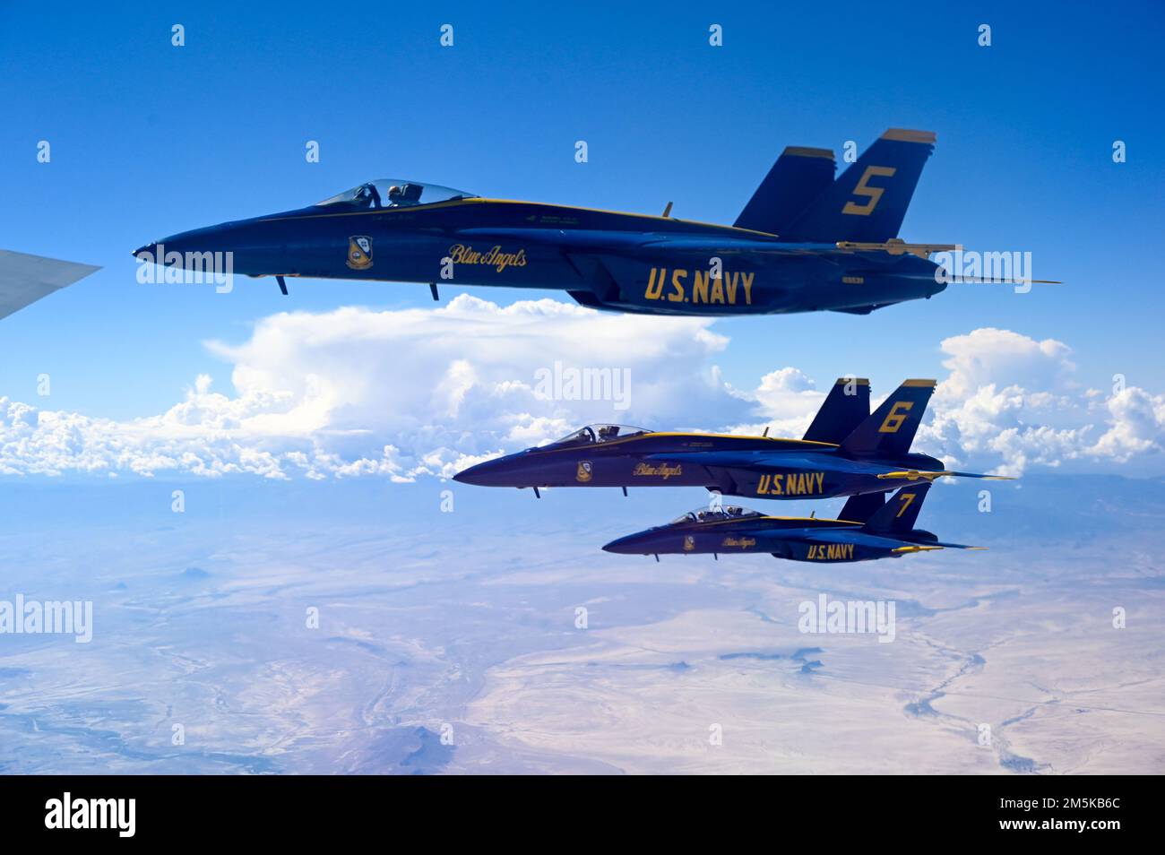 Two U.S. Navy Blue Angel F/A-18E Super Hornets and one F/A-18F fly ...