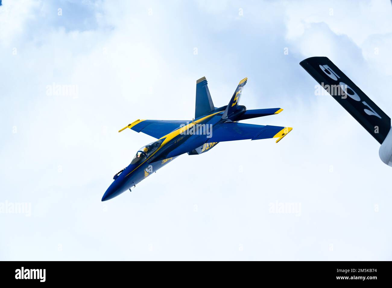 A U.S. Navy Blue Angel F/A-18E Super Hornet departs after receiving ...