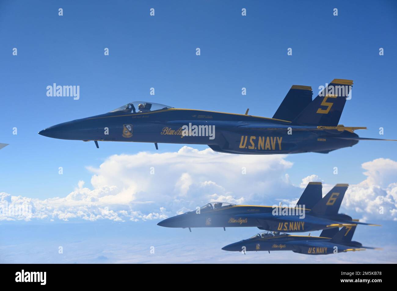 Two U.S. Navy Blue Angel F/A-18E Super Hornets and one F/A-18F fly ...