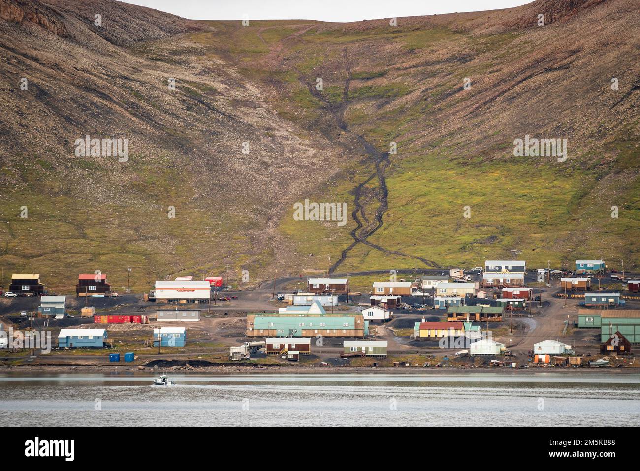 Hamlet of Arctic Bay on the shore of Baffin Island off Admiralty Inlet ...