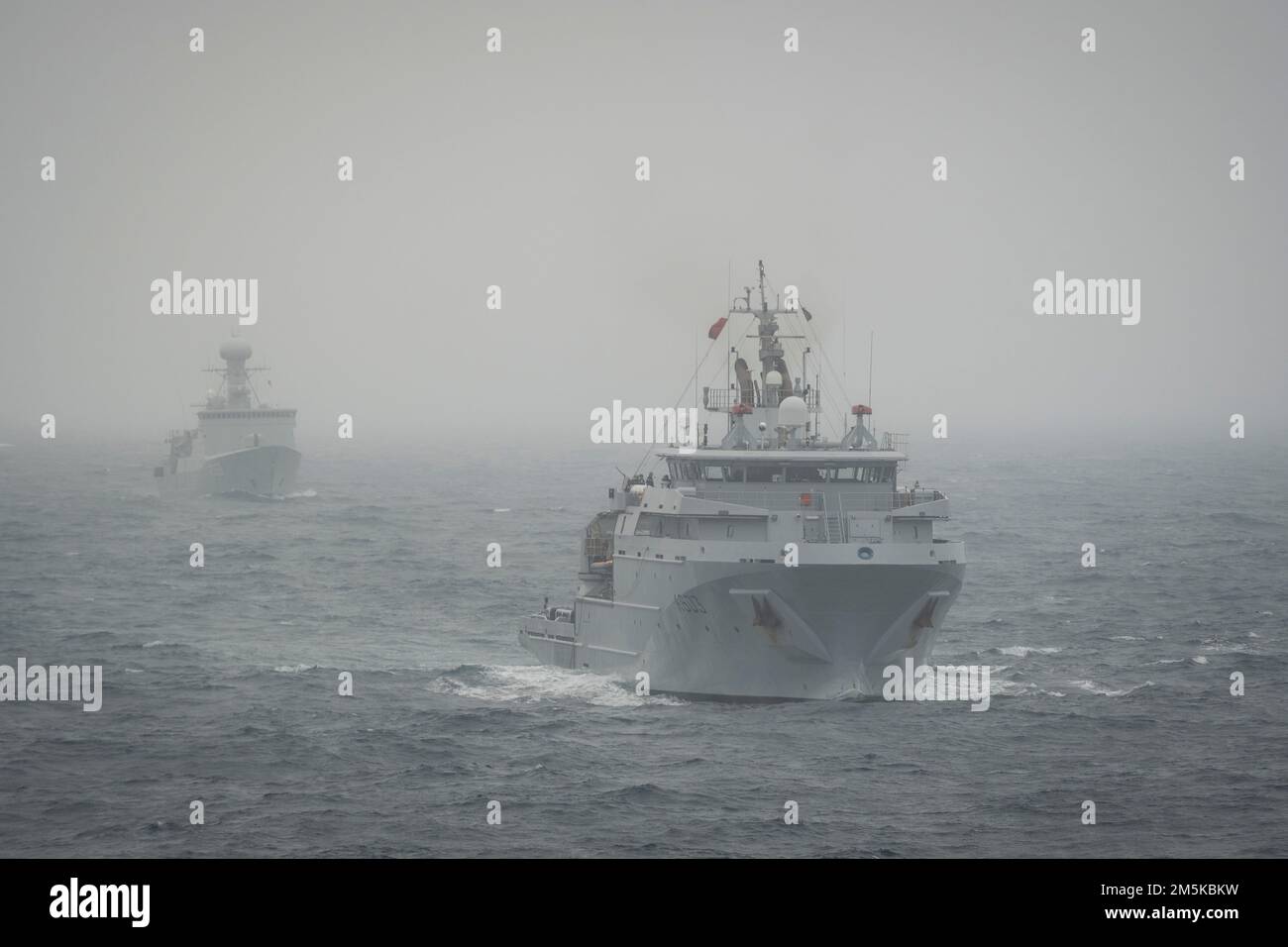 Patrol ships FS Rhone and HDMS Triton at sea in fog leaving Halifax ...