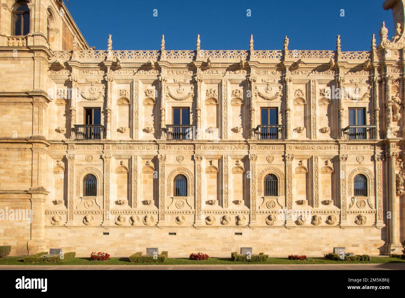 The richly decorated facade of the Parador de León in the 16. century ...