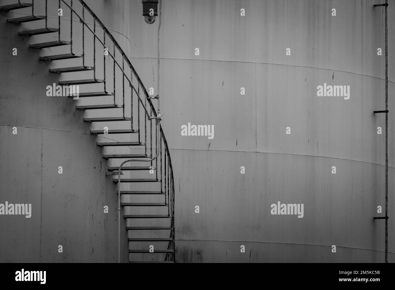 Stairs oil tank in Black and White Stock Photos & Images - Alamy