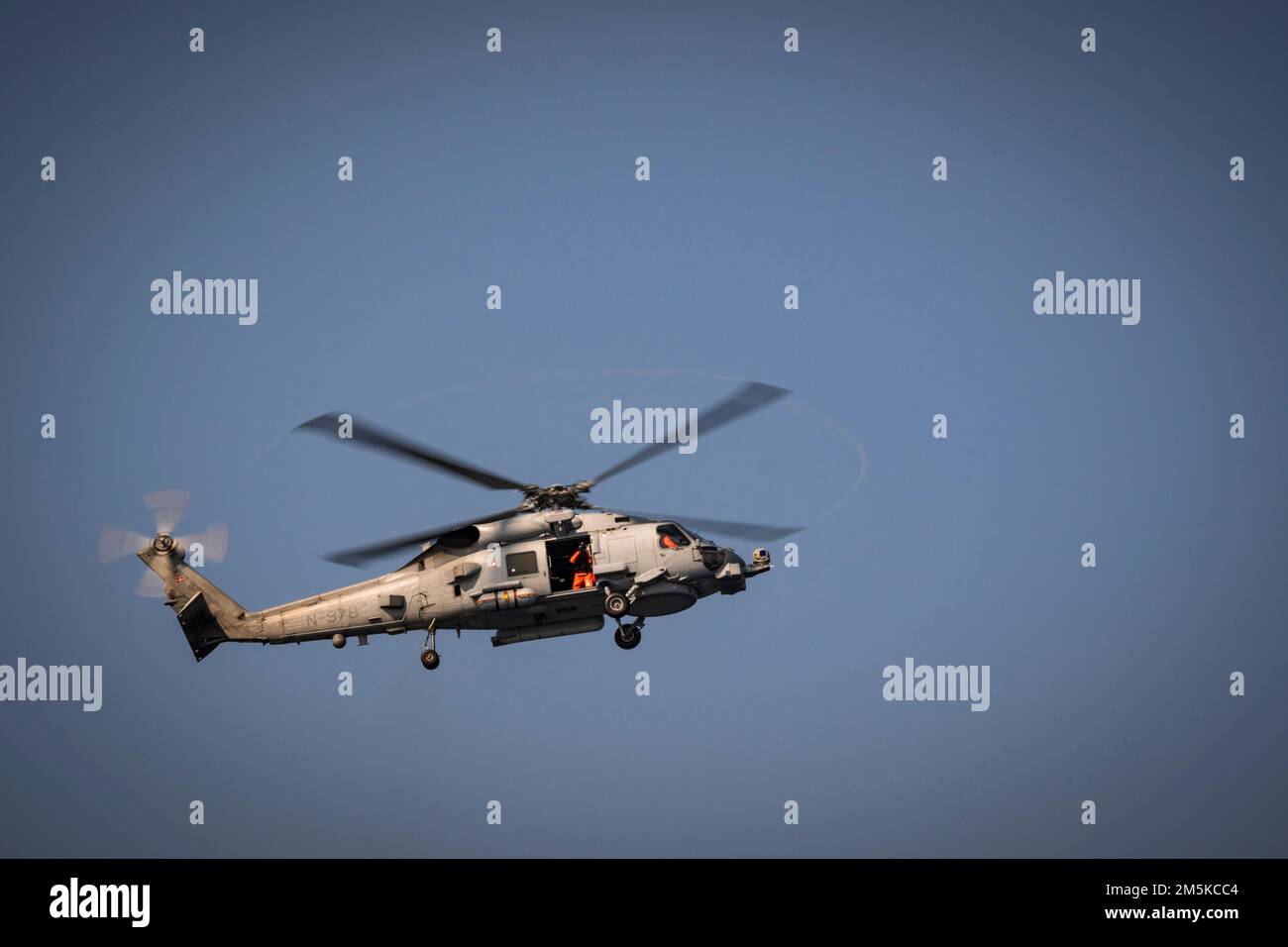 Danish MH-60R Seahawk helicopter flying from the Greenland Patrol Ship ...