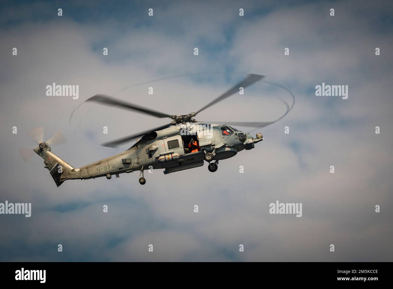Danish MH-60R Seahawk helicopter flying from the Greenland Patrol Ship ...