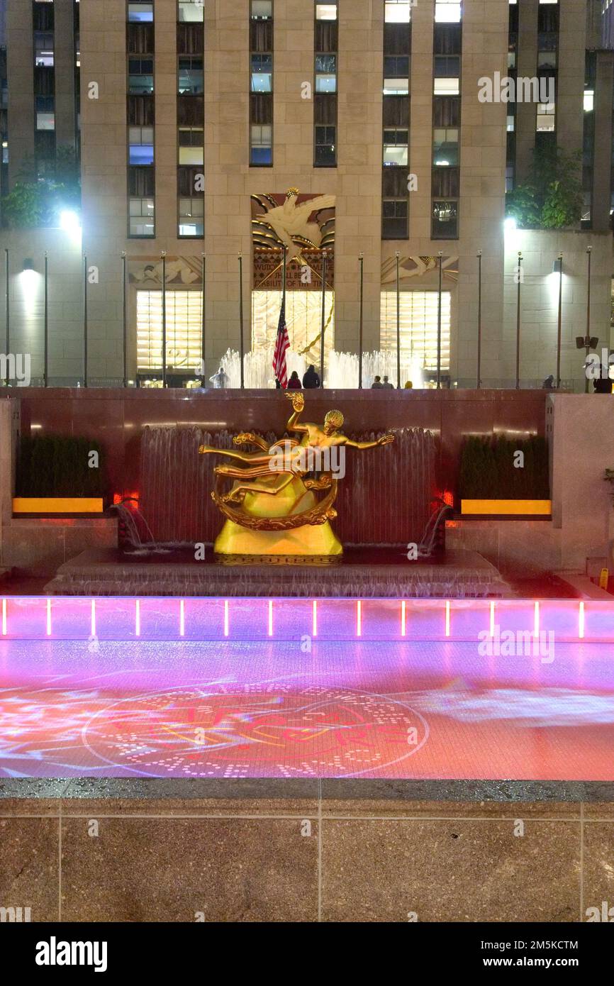Colored Lights on Rockefeller Center Prometheus Statue and Ice Rink ...