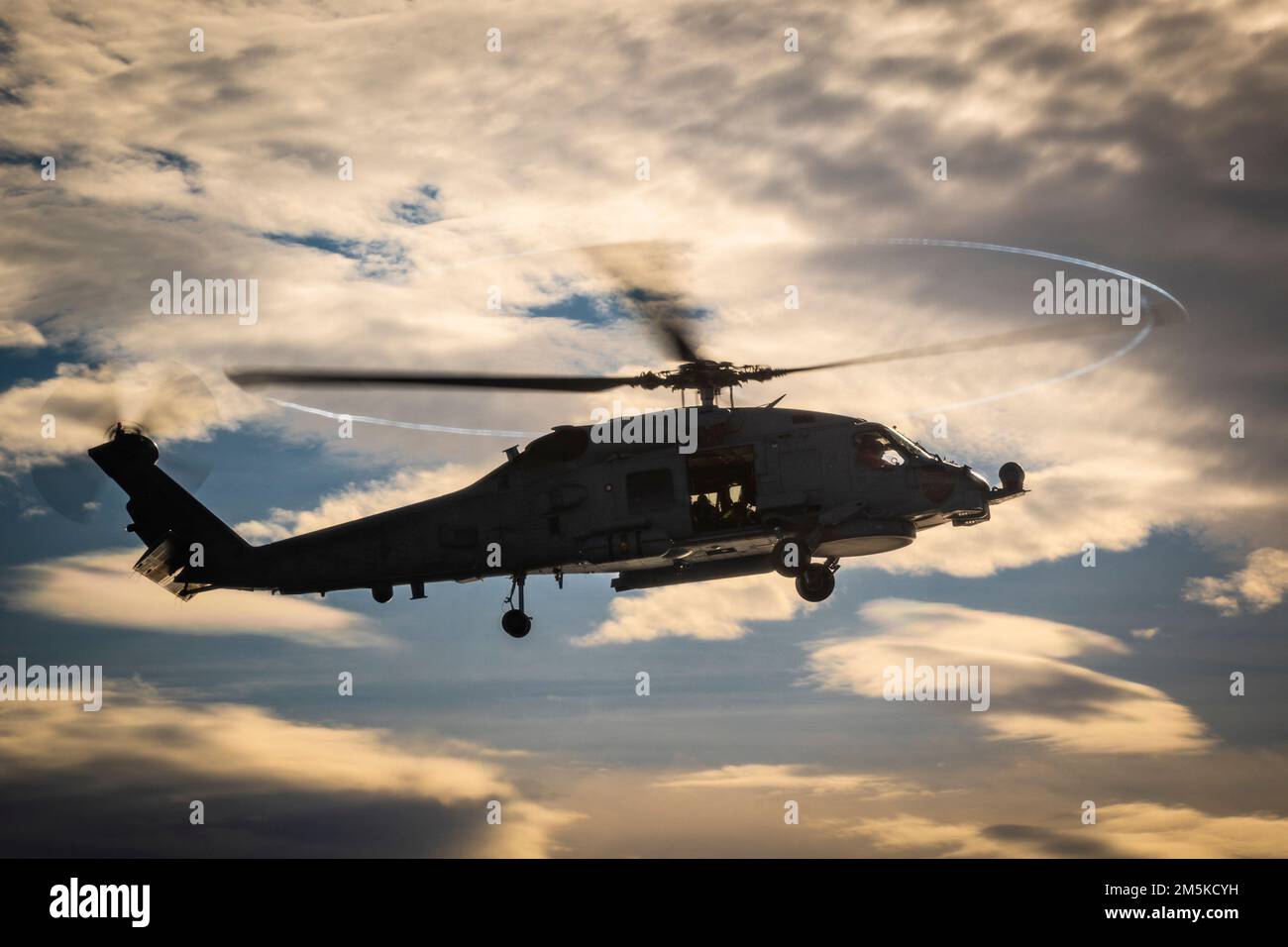 Danish MH-60R Seahawk helicopter flying from the Greenland Patrol Ship ...
