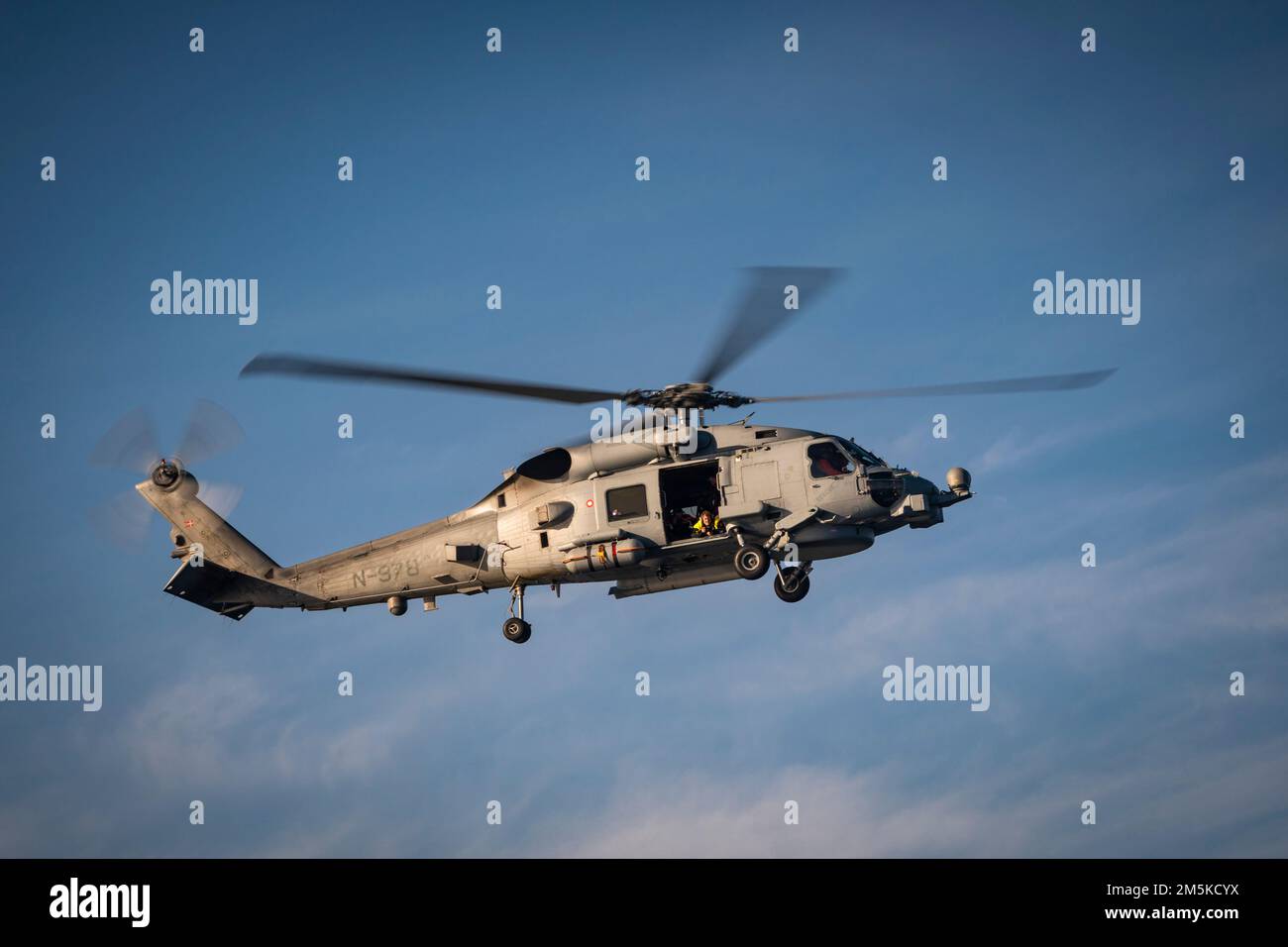Danish MH-60R Seahawk helicopter flying from the Greenland Patrol Ship ...