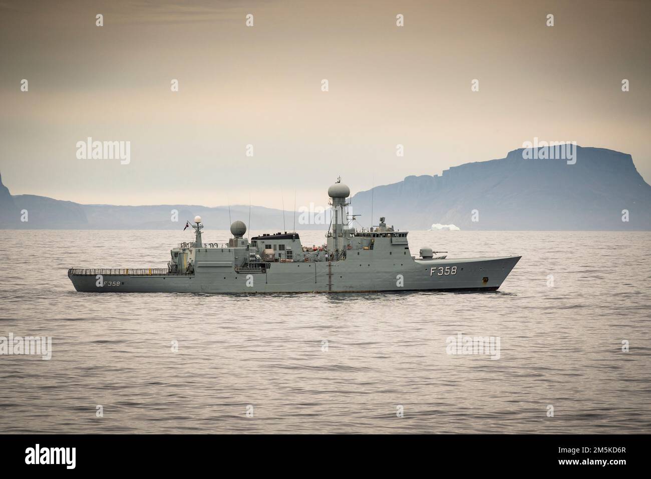 The Danish Navy's Greenland patrol ship HDMS Triton (F358) off the ...
