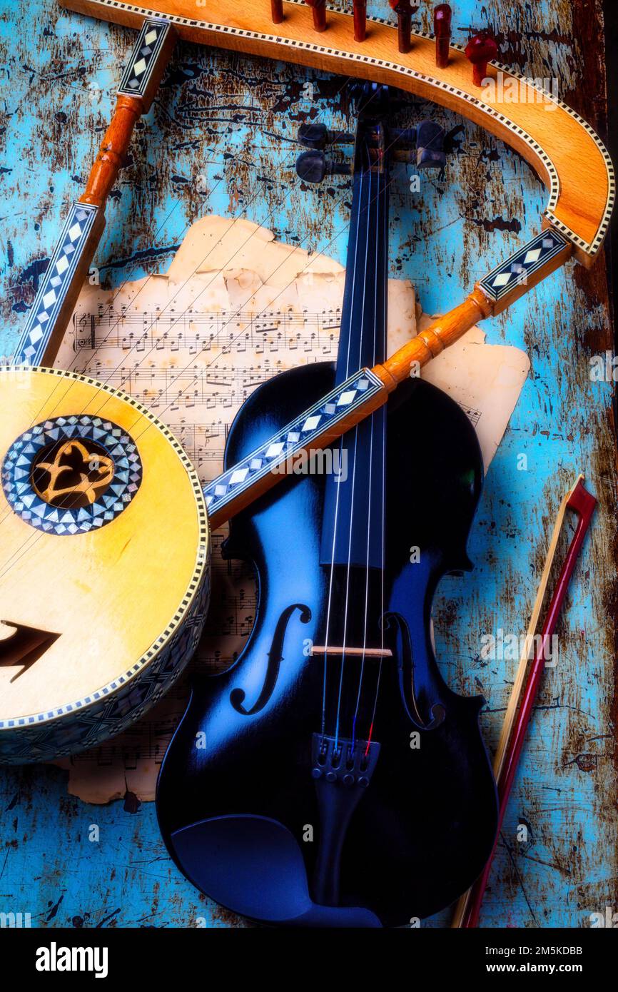 Egyptian Semsemia Harp And Black Violin Still Life Stock Photo - Alamy