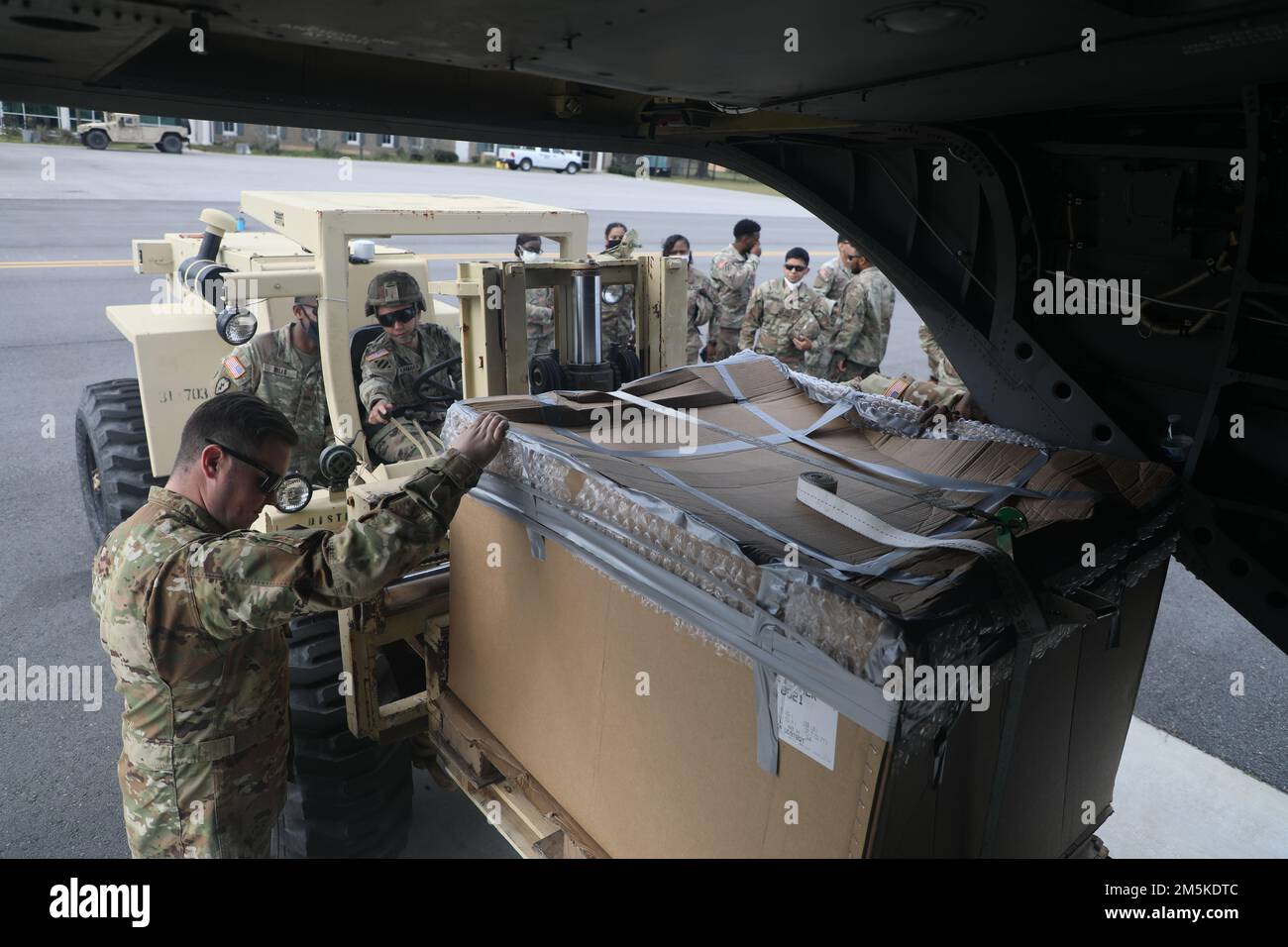 Spc. Julie Kamaka, an automated logistical specialists assigned to the ...