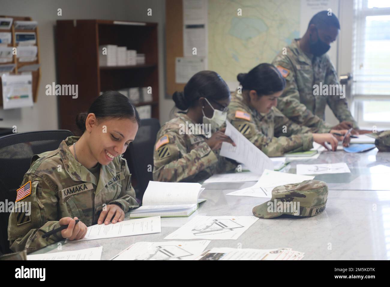 Cpl. Brianna Mattis (left), Spc. Carmona Hannia (middle), Cpl. Jontavis ...