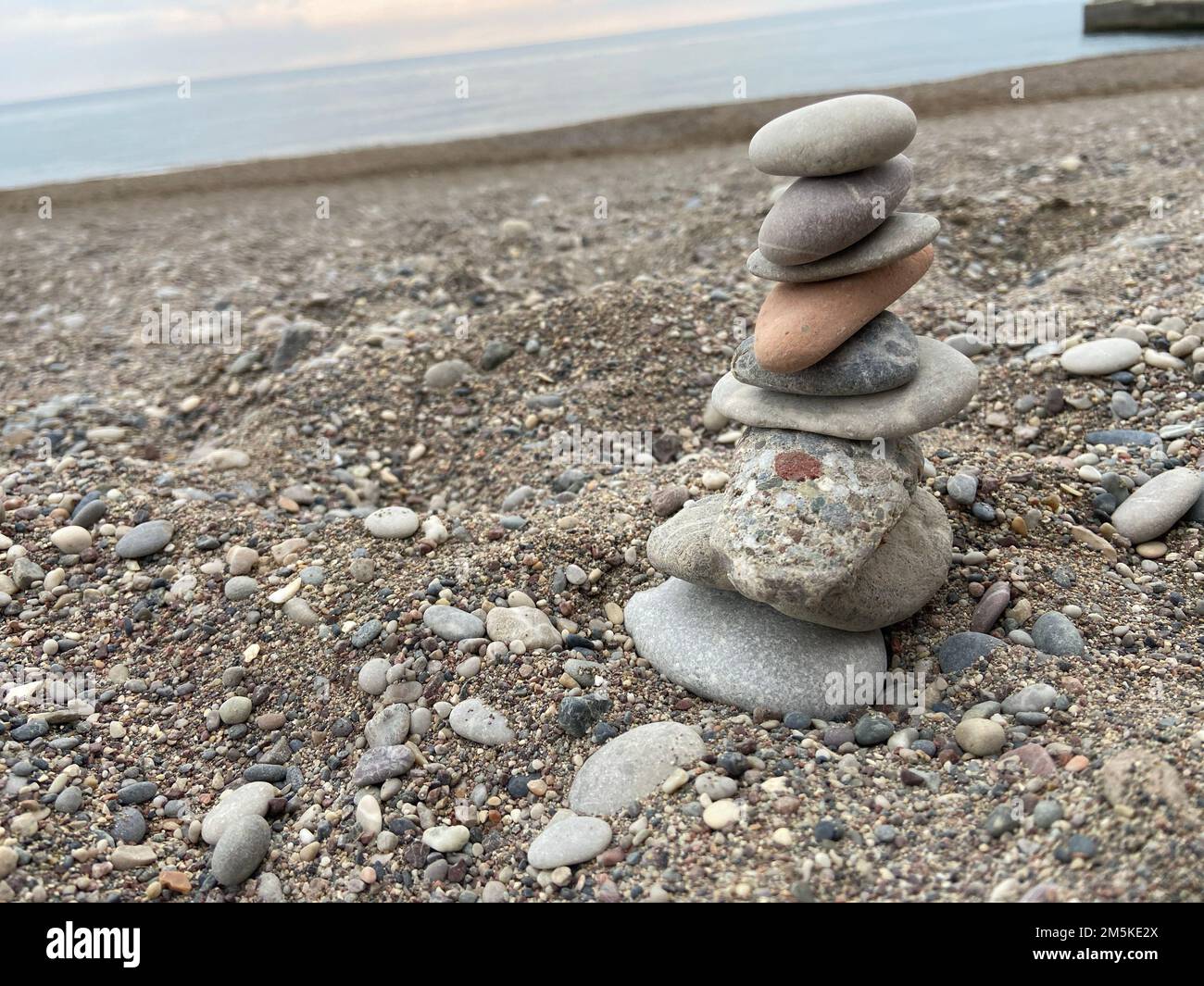 Stone stack on pebble beach hi-res stock photography and images - Alamy
