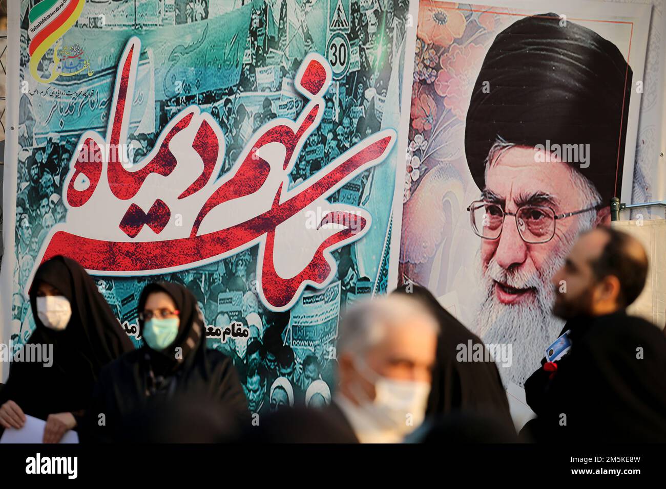 Tehran, Tehran, Iran. 29th Dec, 2022. Iranians stands in front of a ...