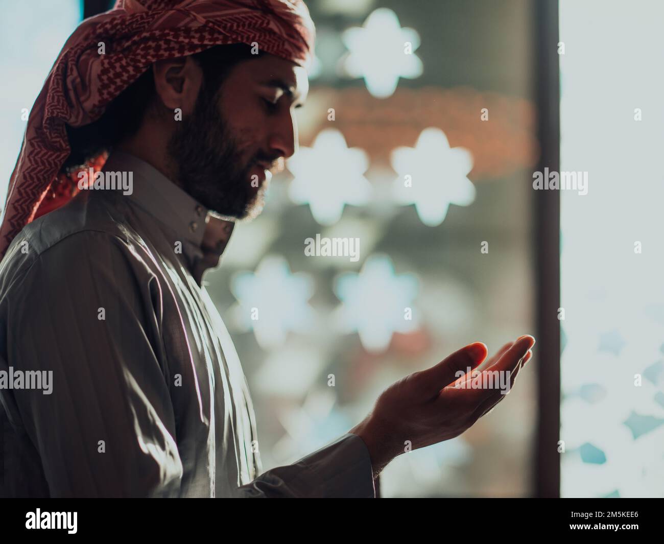 Muslim Arabic man praying. Religious muslim man praying inside the ...