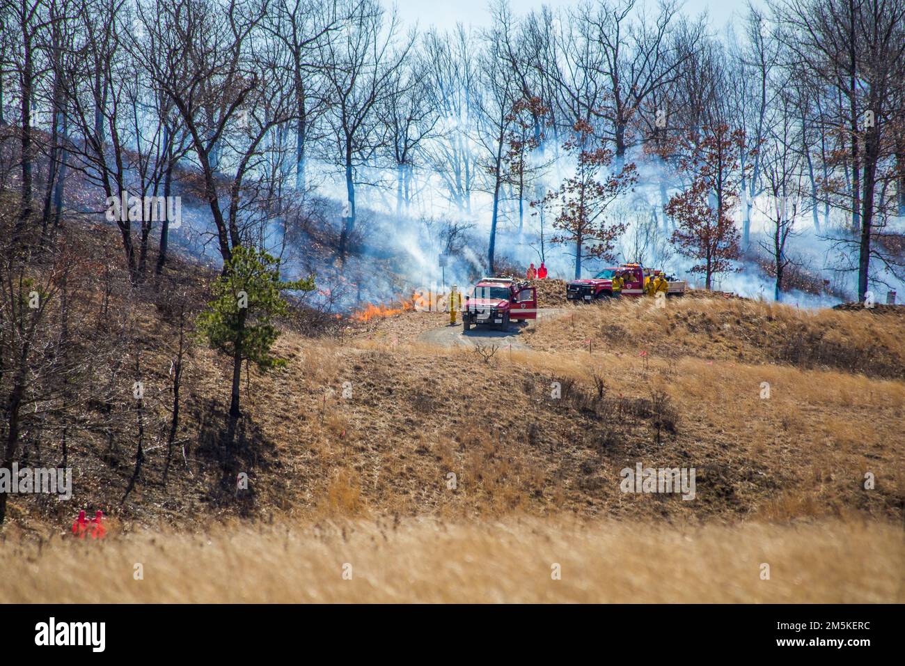 Fire teams on different sides of the fire area are back burning the ...