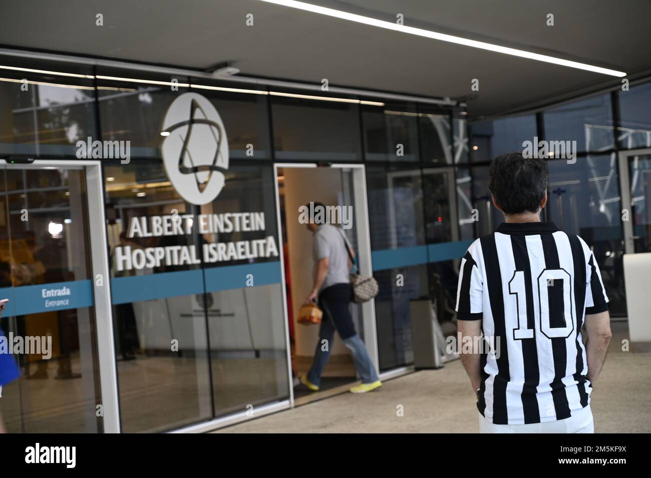 Sao Paulo, Brazil. 29th Dec, 2022. A man stands in front of the ...