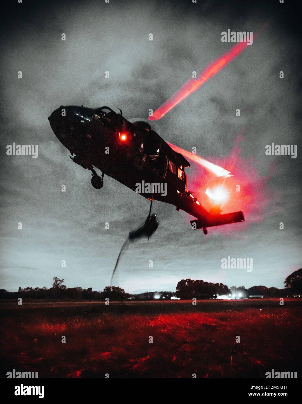 A Royal Thai Army Special Forces Soldier, slides down a fast-rope ...