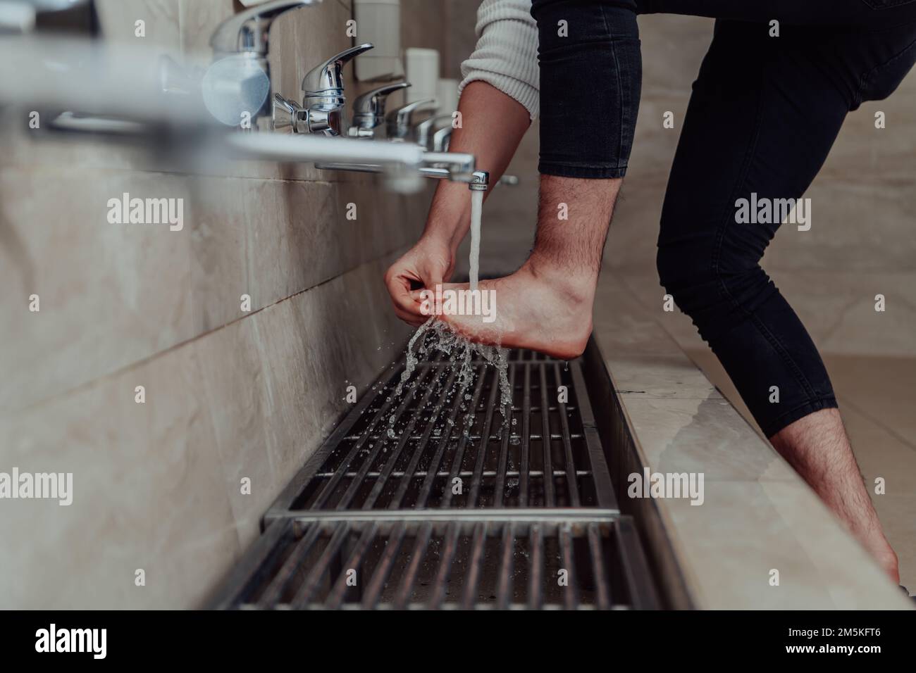 Body wash islamic hi-res stock photography and images - Alamy