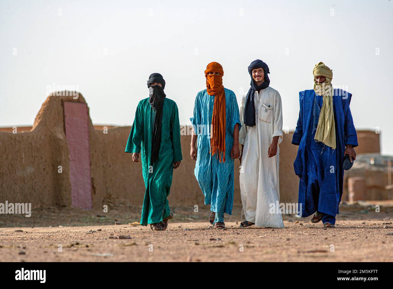 Young traditional Tuareg man walking in Timbuktu, Mali , West Africa ...