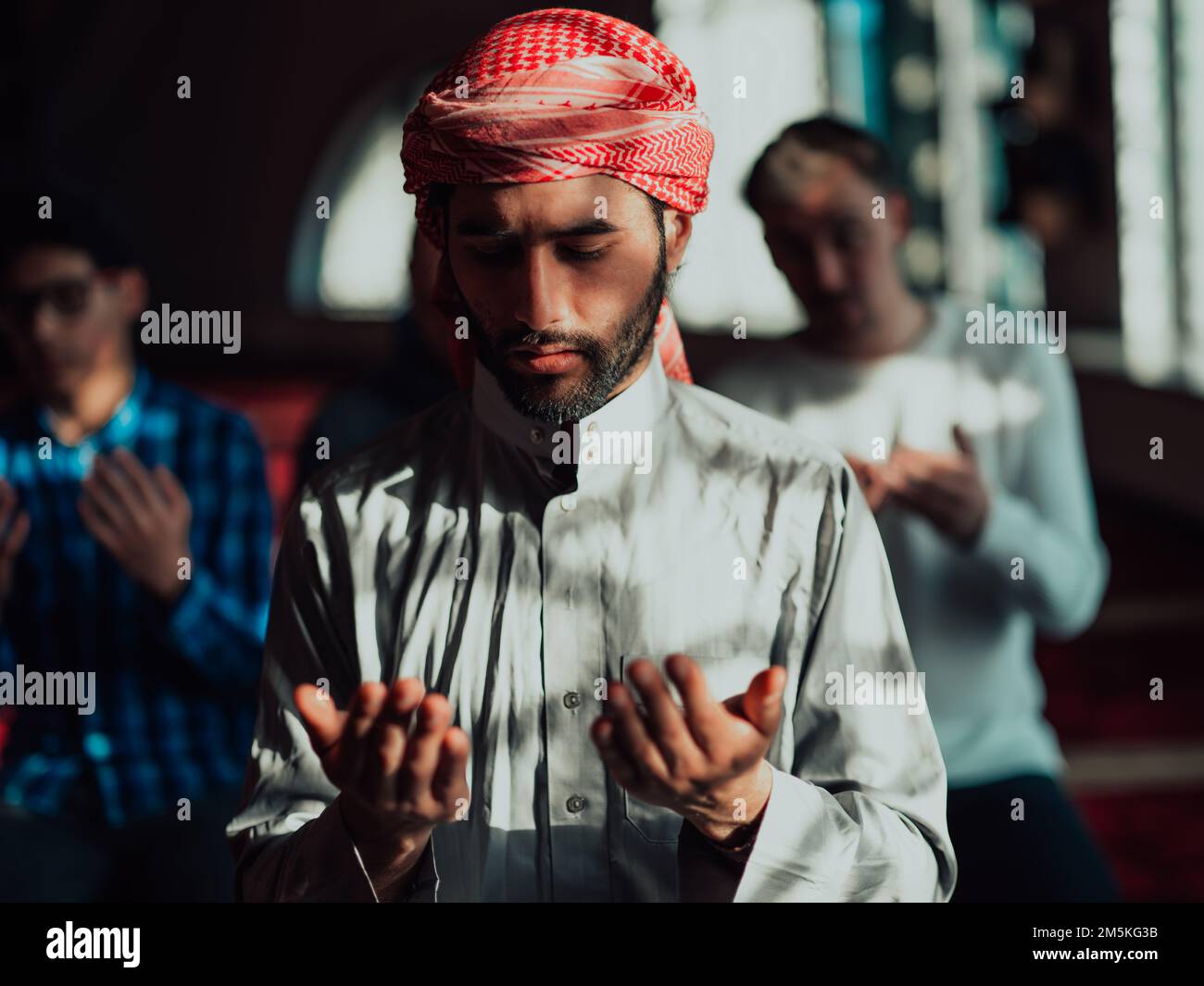 Muslim Arabic man praying. Religious muslim man praying inside the ...