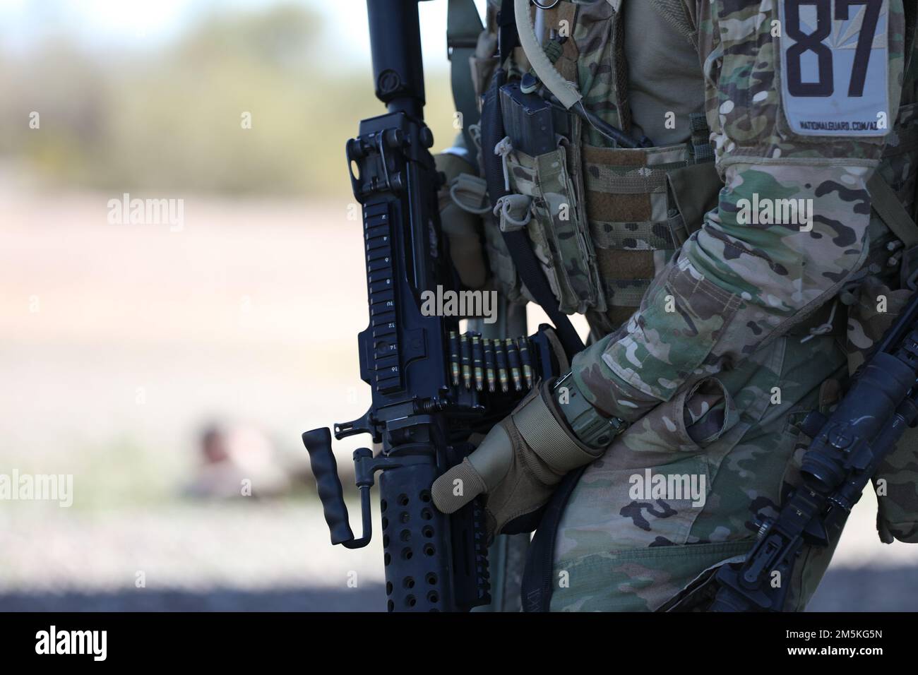 Sgt. Andrew Garcia with the 856th Military Police Company provides ...