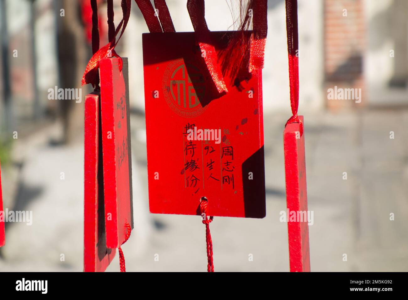 The red Hanging Ornaments in Chinese wishing tree Stock Photo - Alamy