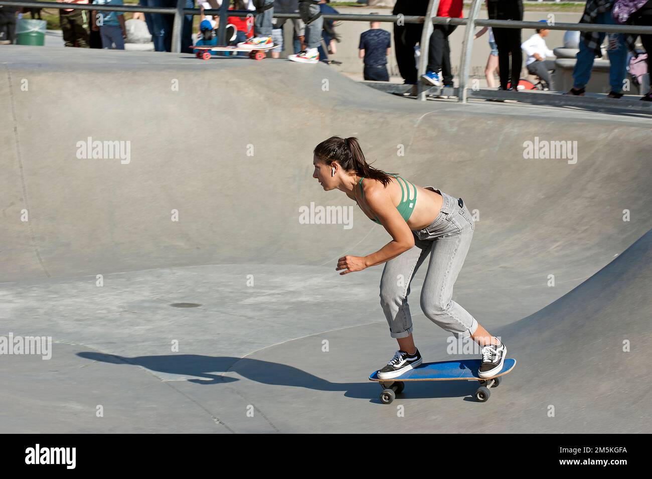 Girl skateboarding at Venice Beach skate park Stock Photo - Alamy