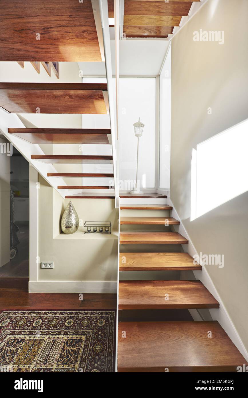 Design stairs of a single-family home with a white metal structure and ...