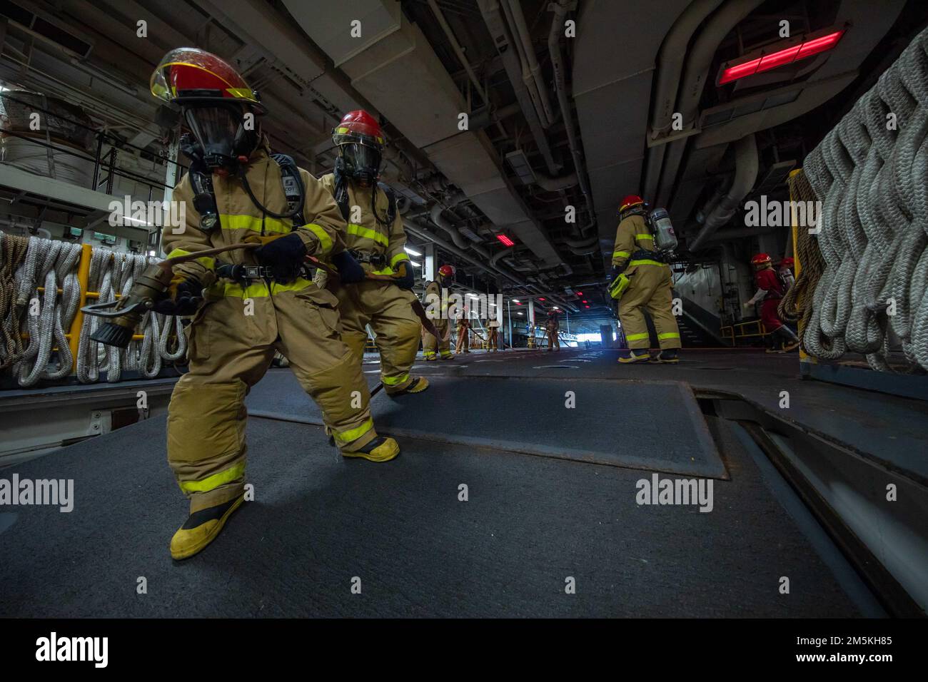 220323-N-XK047-1059 PACIFIC OCEAN (March 23, 2022) - Sailors combat a ...