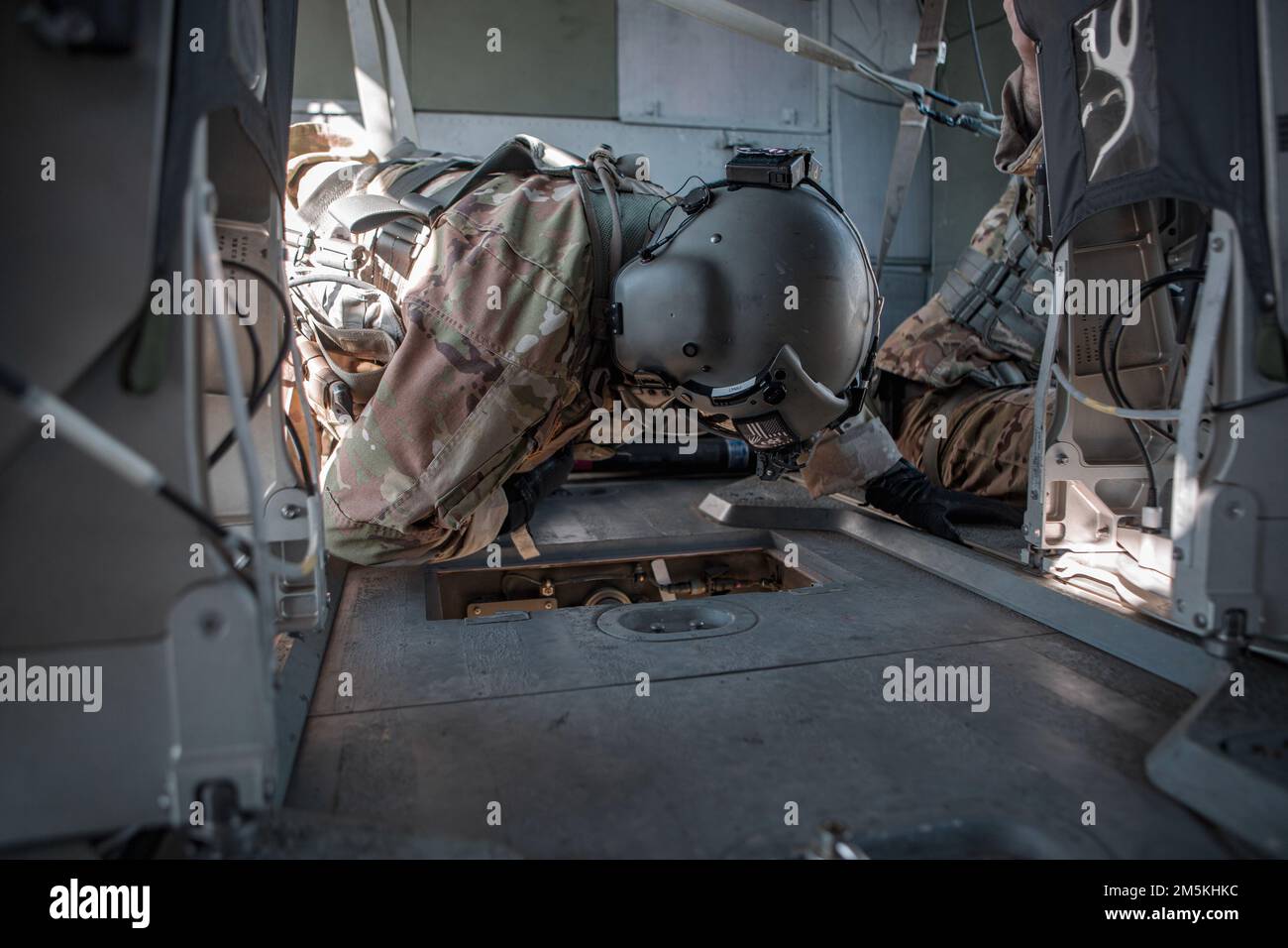 U.S. Army Sgt. Nester Pino, a UH-60 Black Hawk crew chief with Golf ...