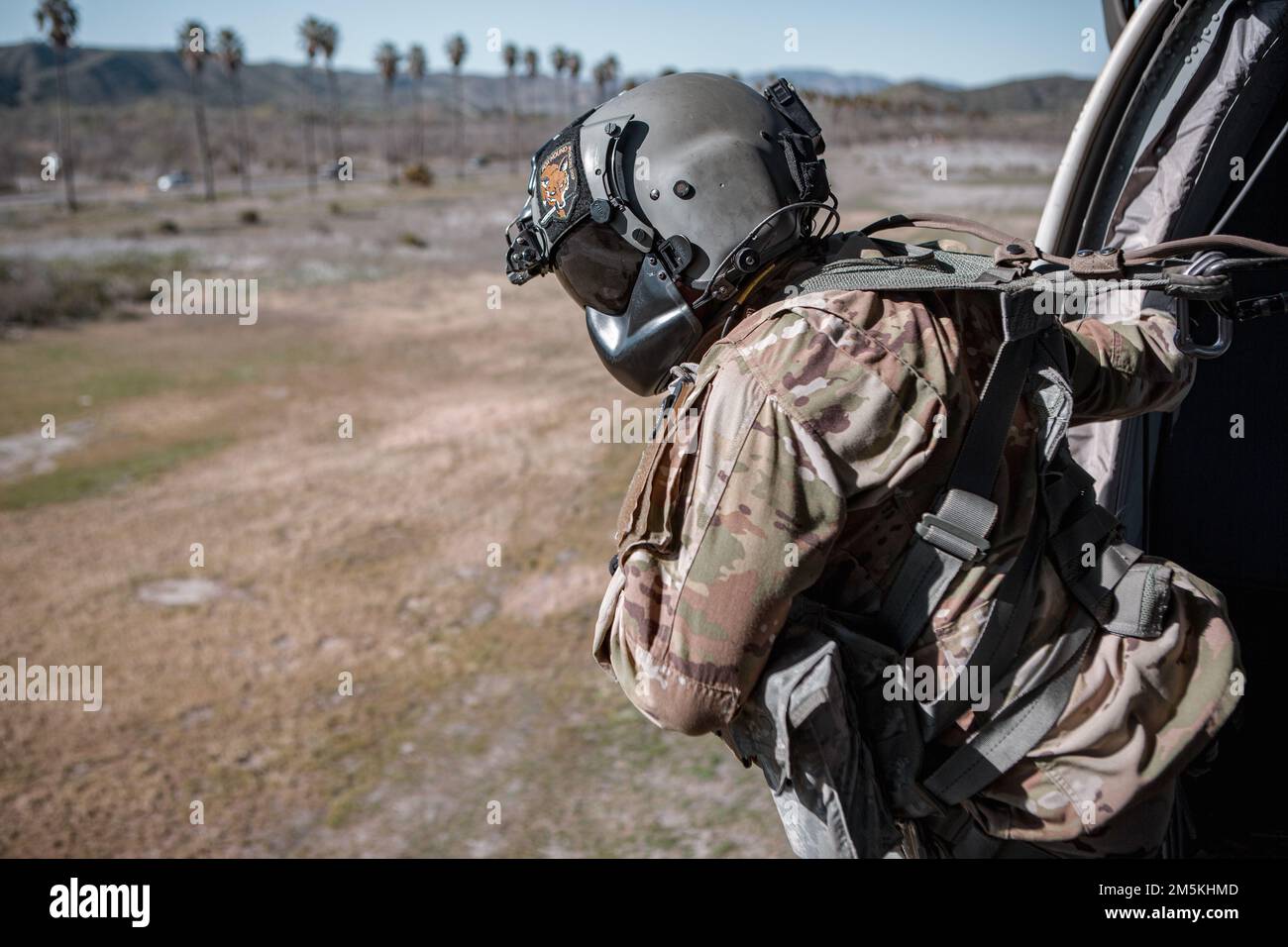 U.S. Army Sgt. Nester Pino, a UH-60 Black Hawk crew chief with Golf ...
