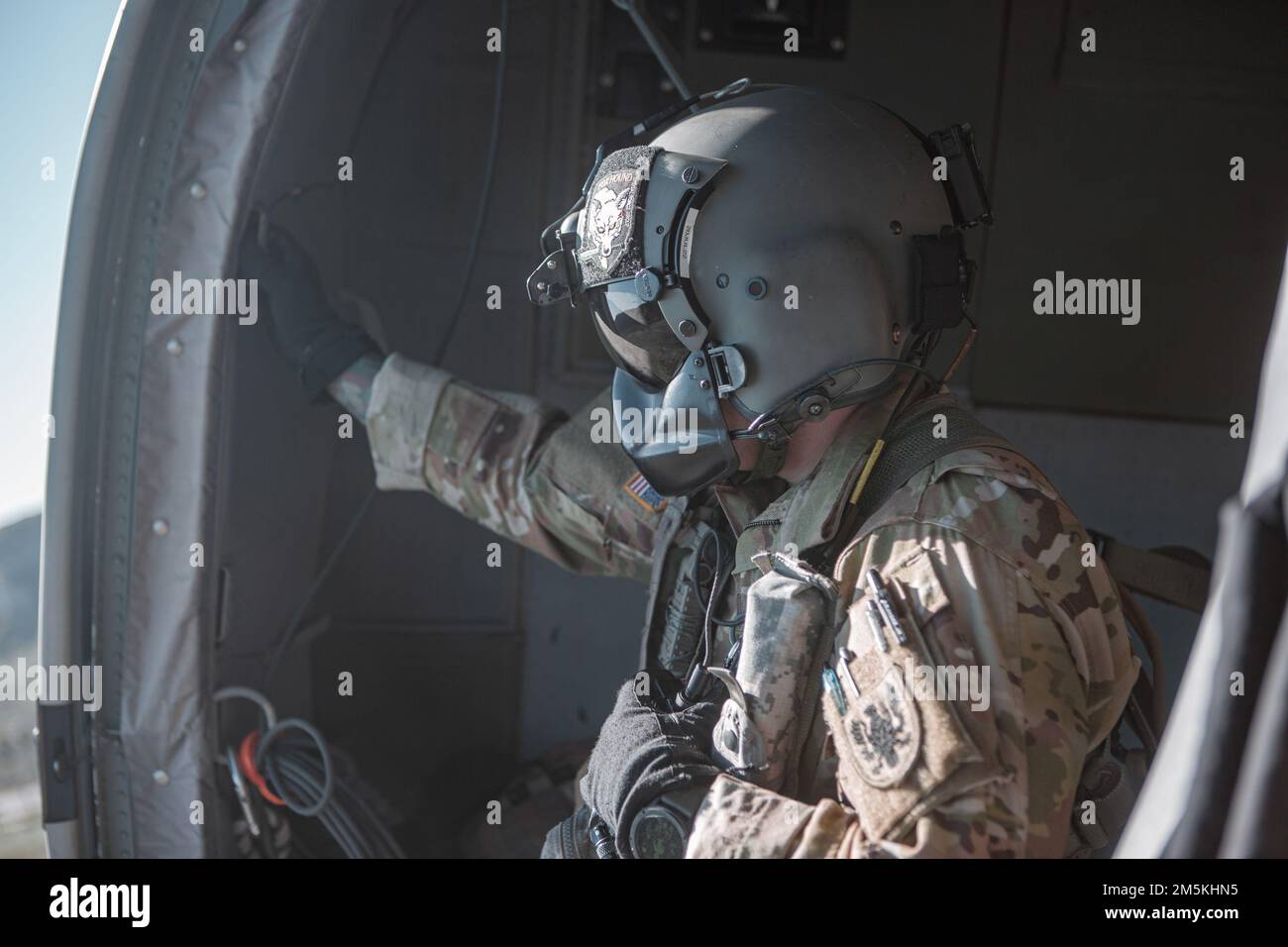 U.S. Army Sgt. Nester Pino, a UH-60 Black Hawk crew chief with Golf ...