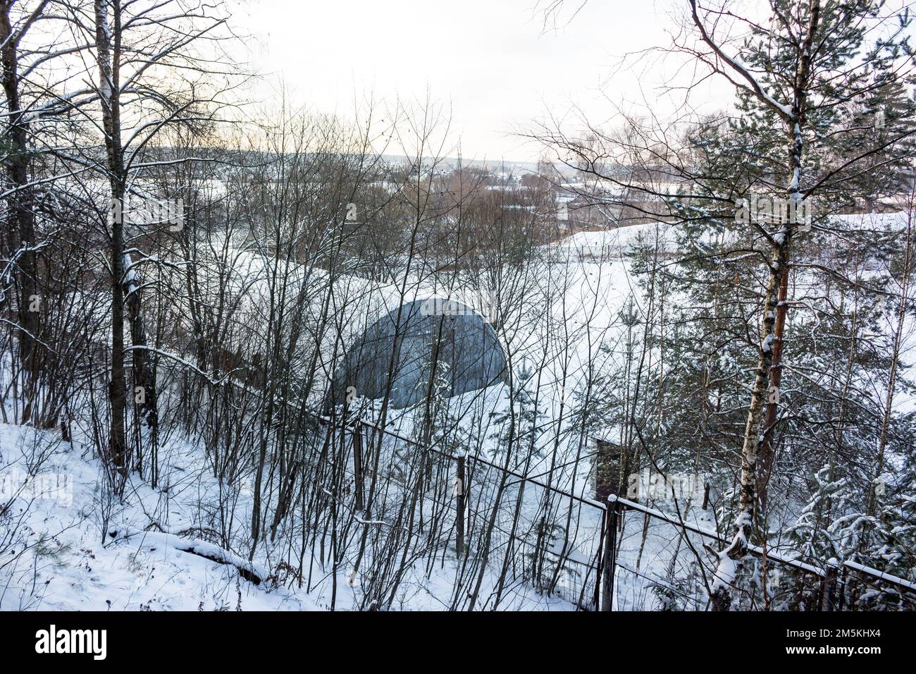 Military warehouse hangar located on a territory closed by a fence in ...