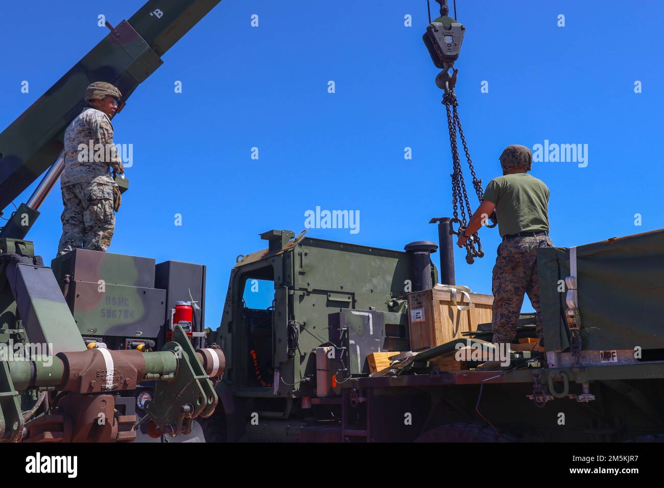 U.S. Marine Corps Lance Cpl. Alex Estaban, a vehicle recovery operator ...