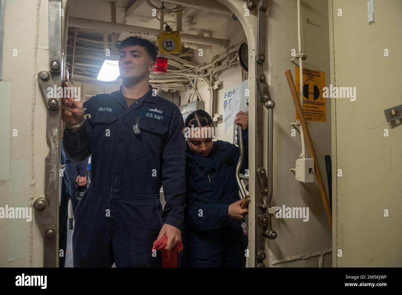SASEBO, Japan (March 22, 2022) Airman Sierra Rodriguez, right, from ...