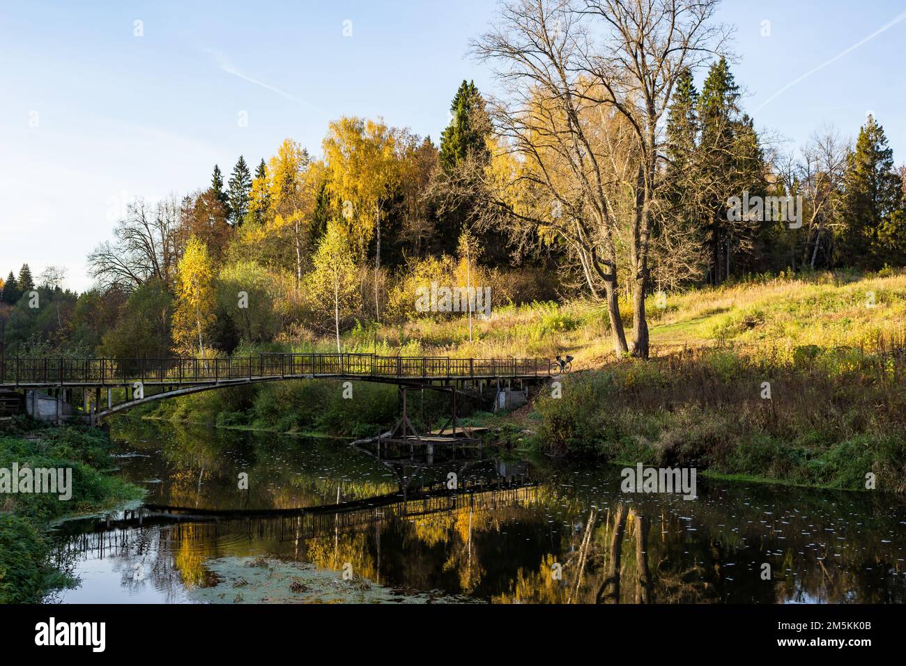 View of the metal pedestrian bridge across the Nara River, Russia Stock ...