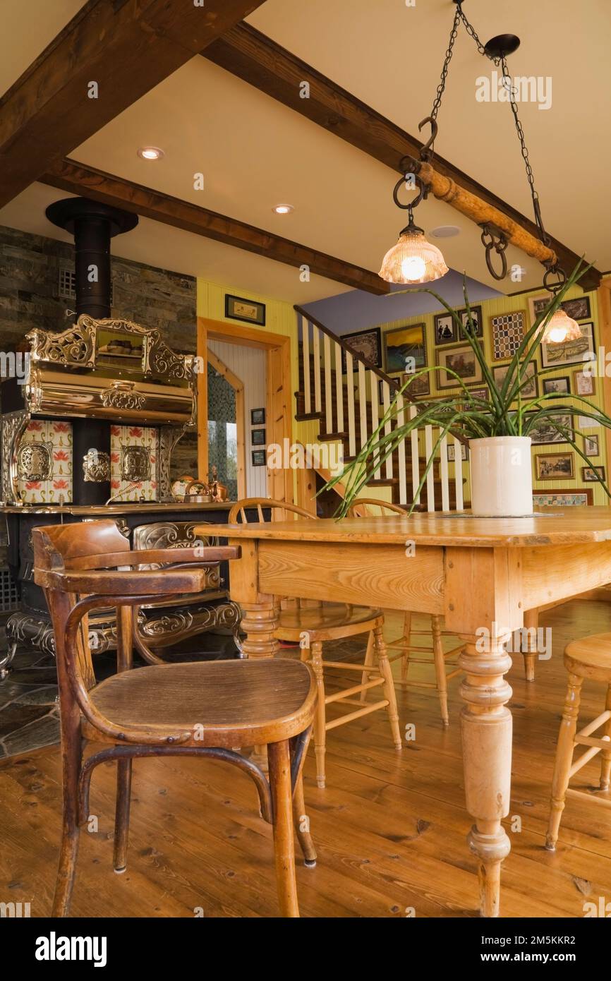 Old wooden dining table with chairs, retro Royal model wood burning ...