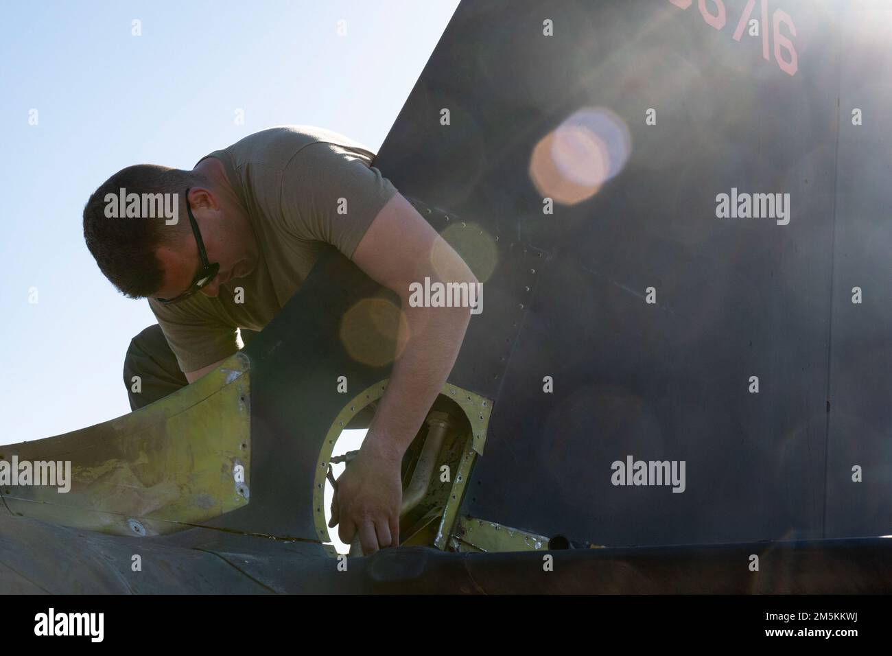 A U.S. Air Force Airman assigned to the 309th Aircraft Battle Damage ...