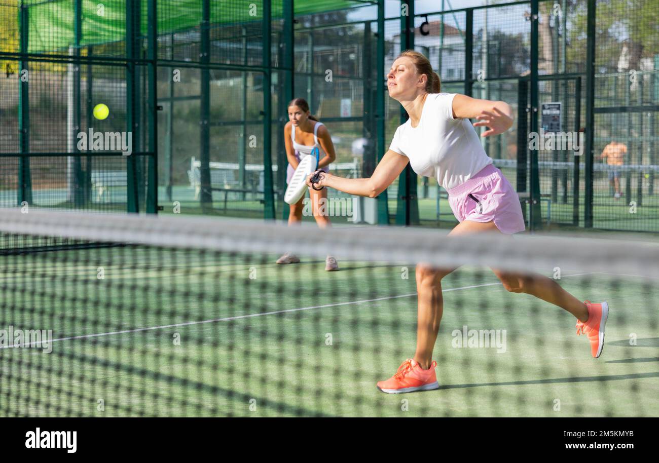 Female play padel tennis hi-res stock photography and images - Alamy