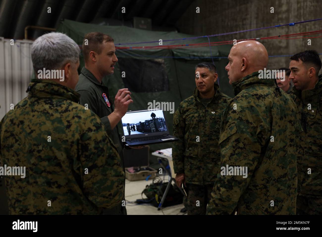 U.S. Marine Corps Capt. Tyler Frizzell shows a video to the Commandant ...