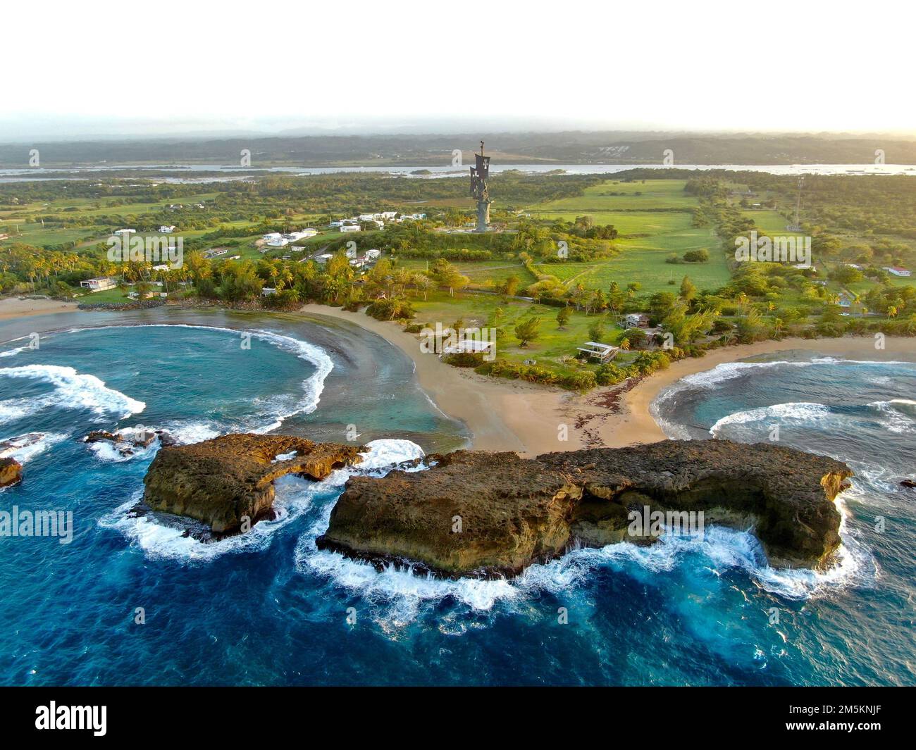 An aerial view of a beach with big rocks and waves Stock Photo - Alamy